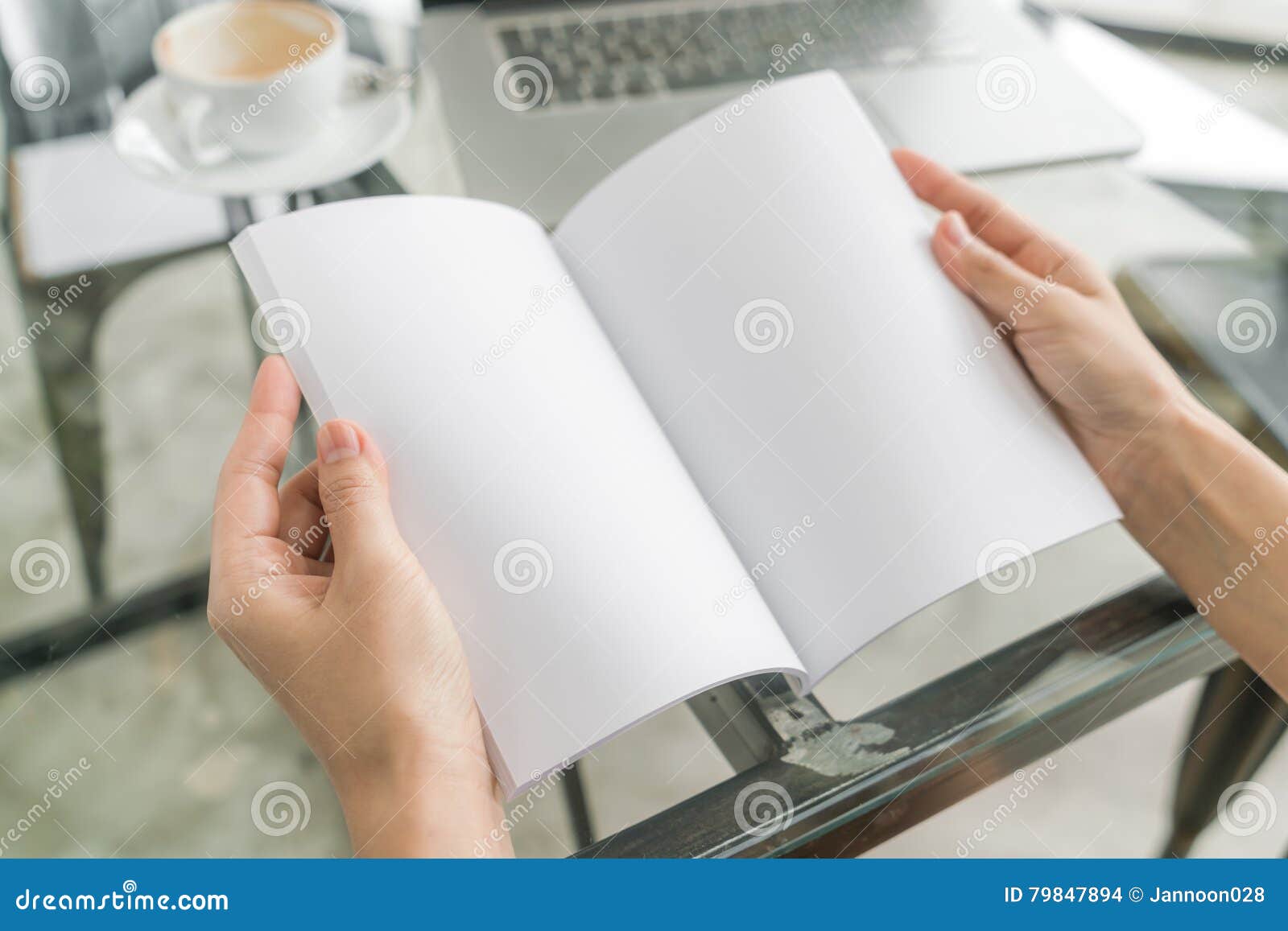 Hands open book on table . stock photo. Image of notebook - 79847894