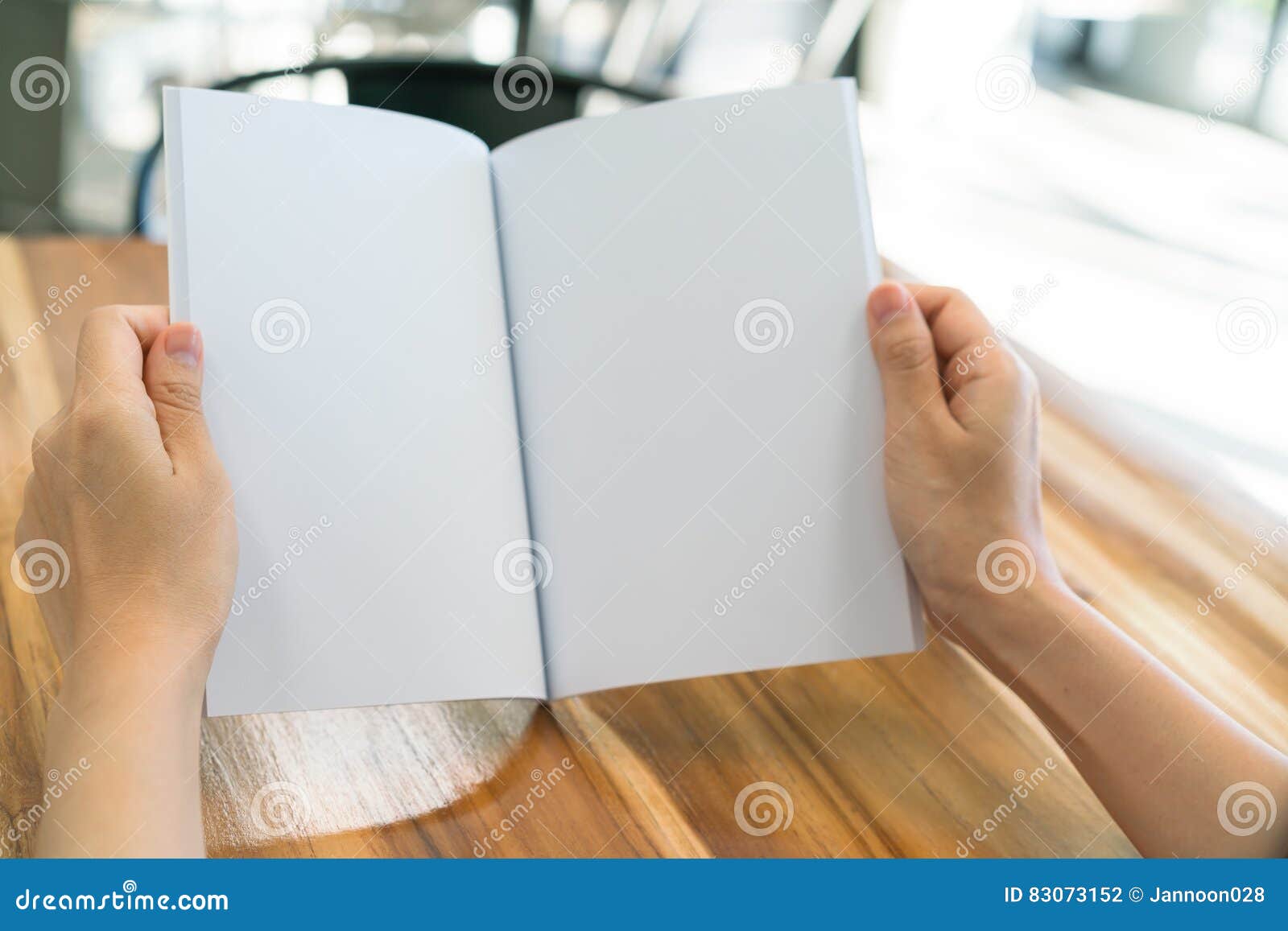Hands Open Book on Wood Table . Stock Photo - Image of background ...