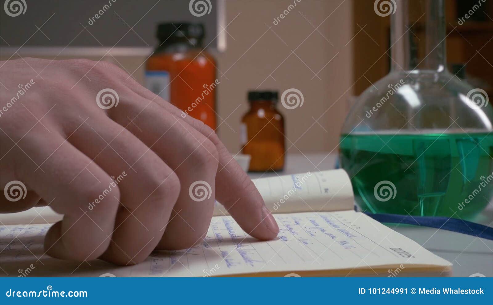 Hands Open and Looking Something in a Diary, Notebook. Hands of the ...