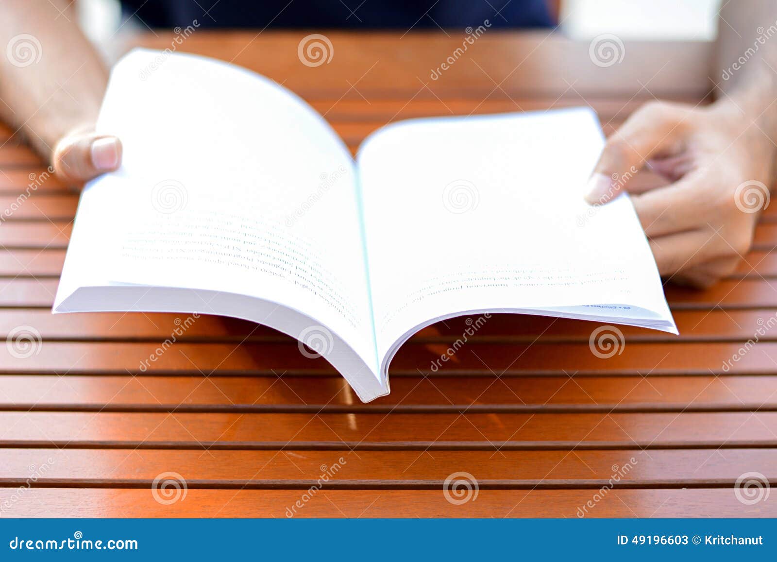 Hands Opening Book on the Table Stock Image - Image of young, book ...