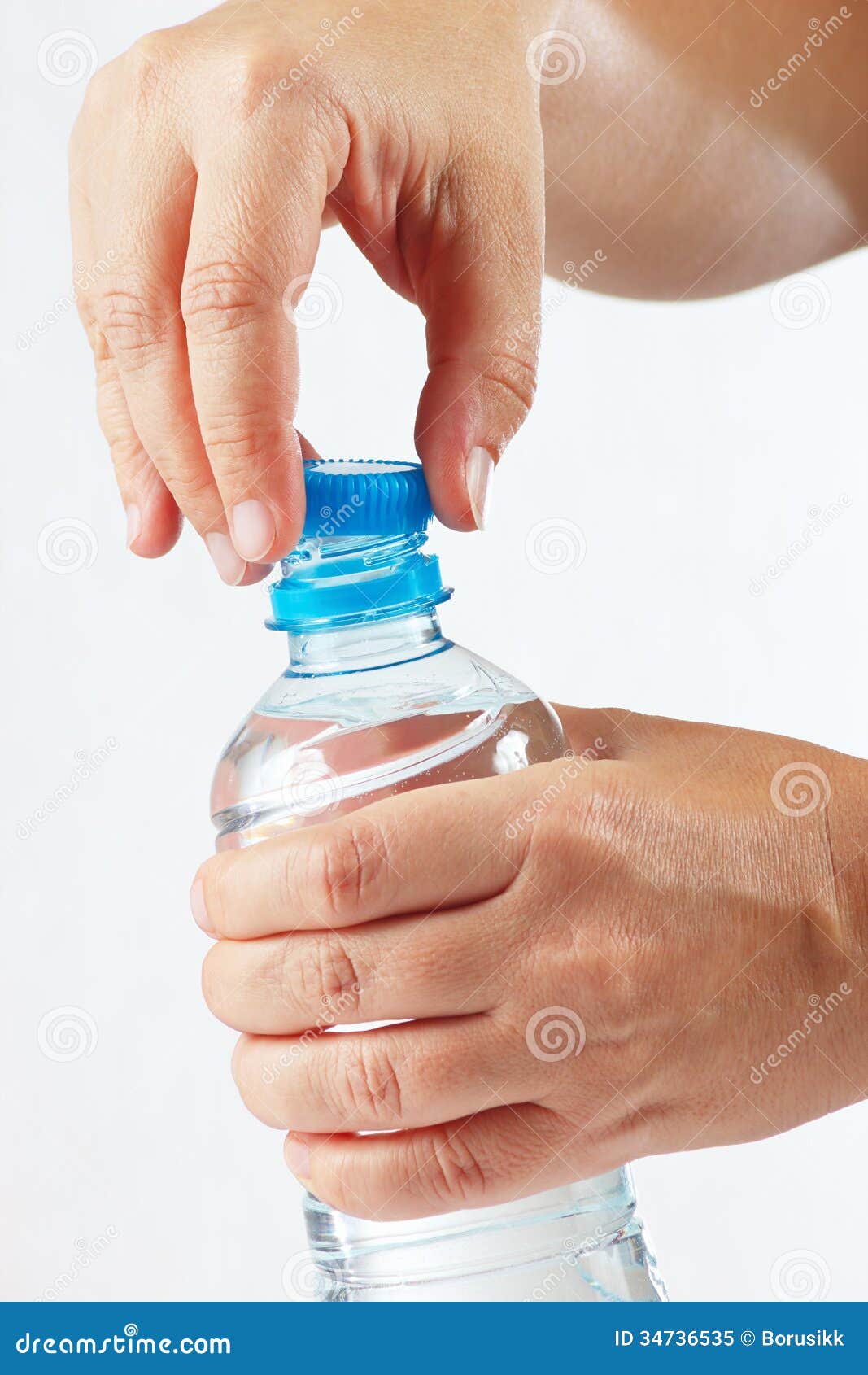 Hands Opening a Small Bottle of Fresh Water Stock Image - Image of full ...