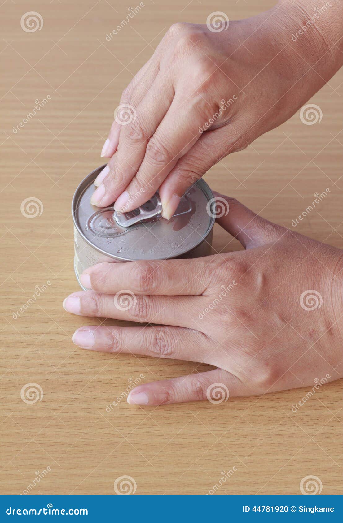 Hands Opening a Soda Can. Isolated on White Background. Stock Photo ...