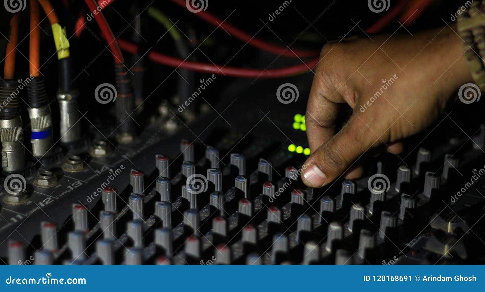 DJ Operating Soundboard Or Mixing Console Use In Sound Recording And ...