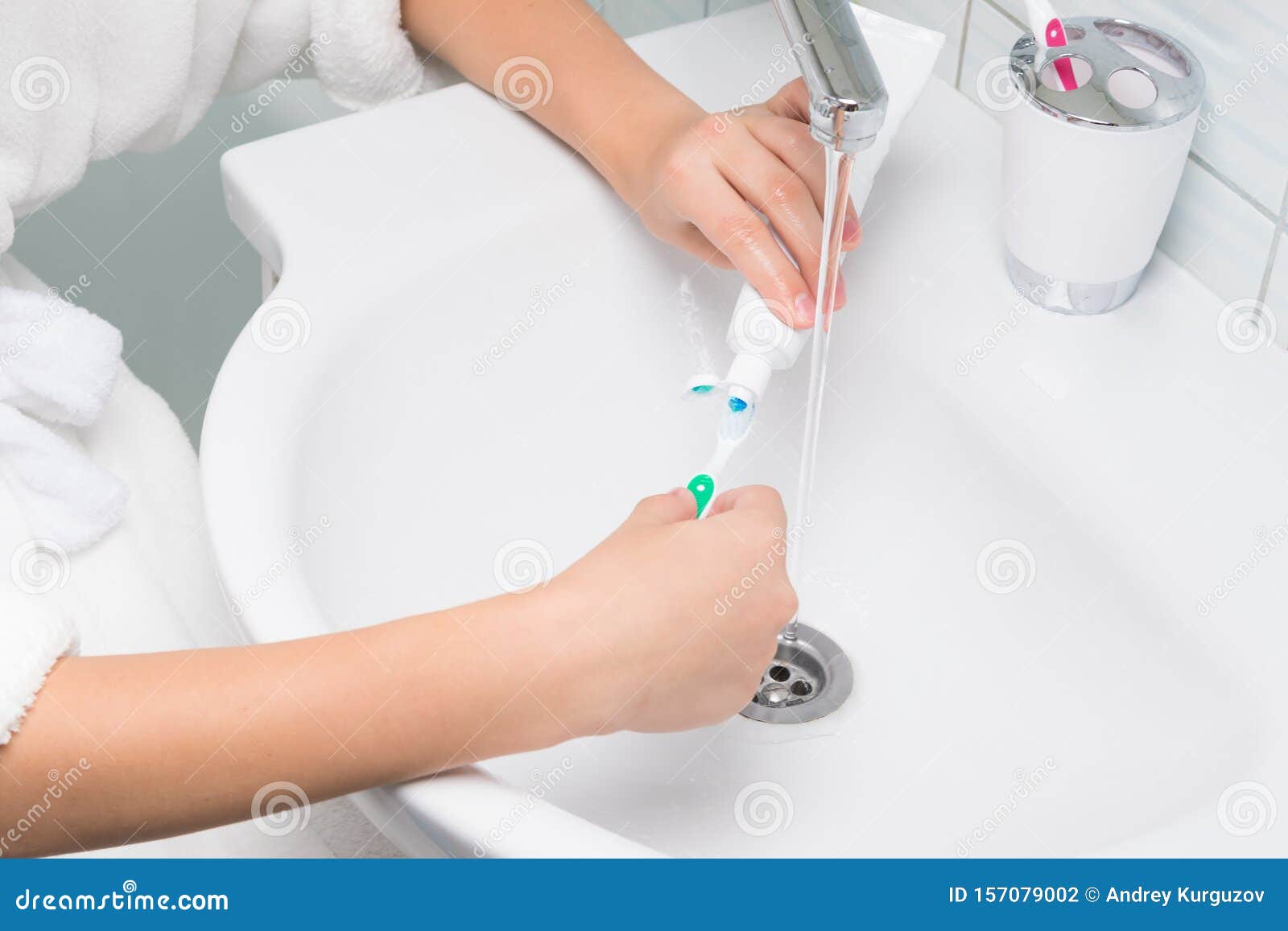 Hands Over the Sink Apply Toothpaste To the Brush, Top View Close-up ...