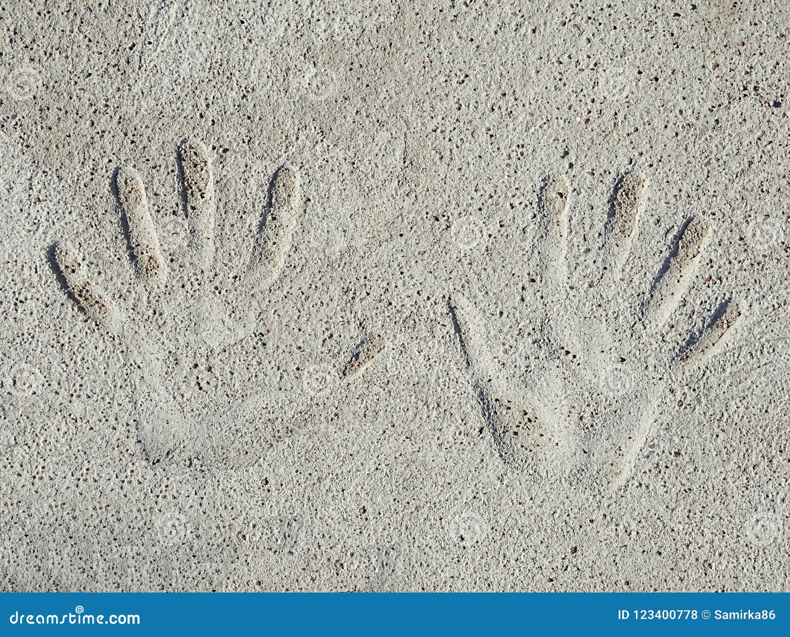 Hands Palms Imprints on Concrete Wall Surface Stock Photo - Image of ...