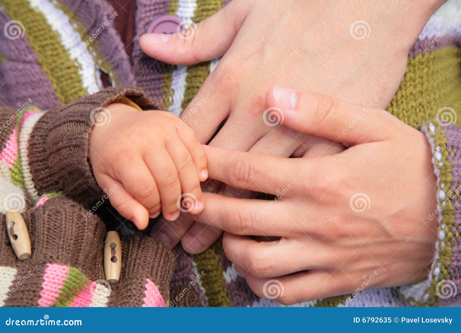 Hands of parents and child stock image. Image of positive - 6792635