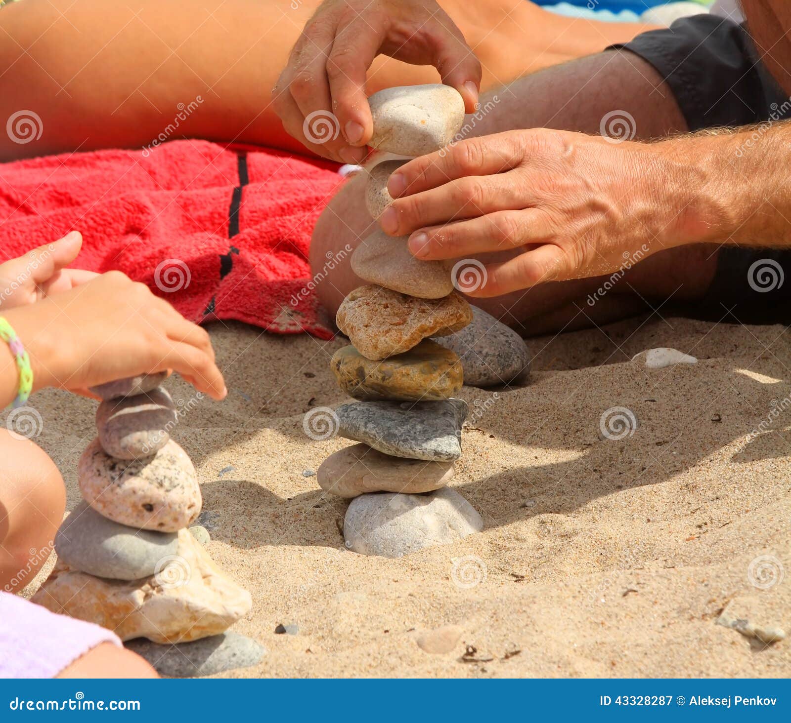 Hands with the Pebbles Stacks Stock Image - Image of pebble, beach ...