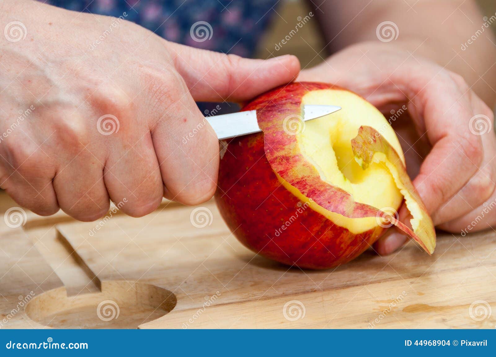 Hands peeling apple stock photo. Image of healthy, hand - 44968904