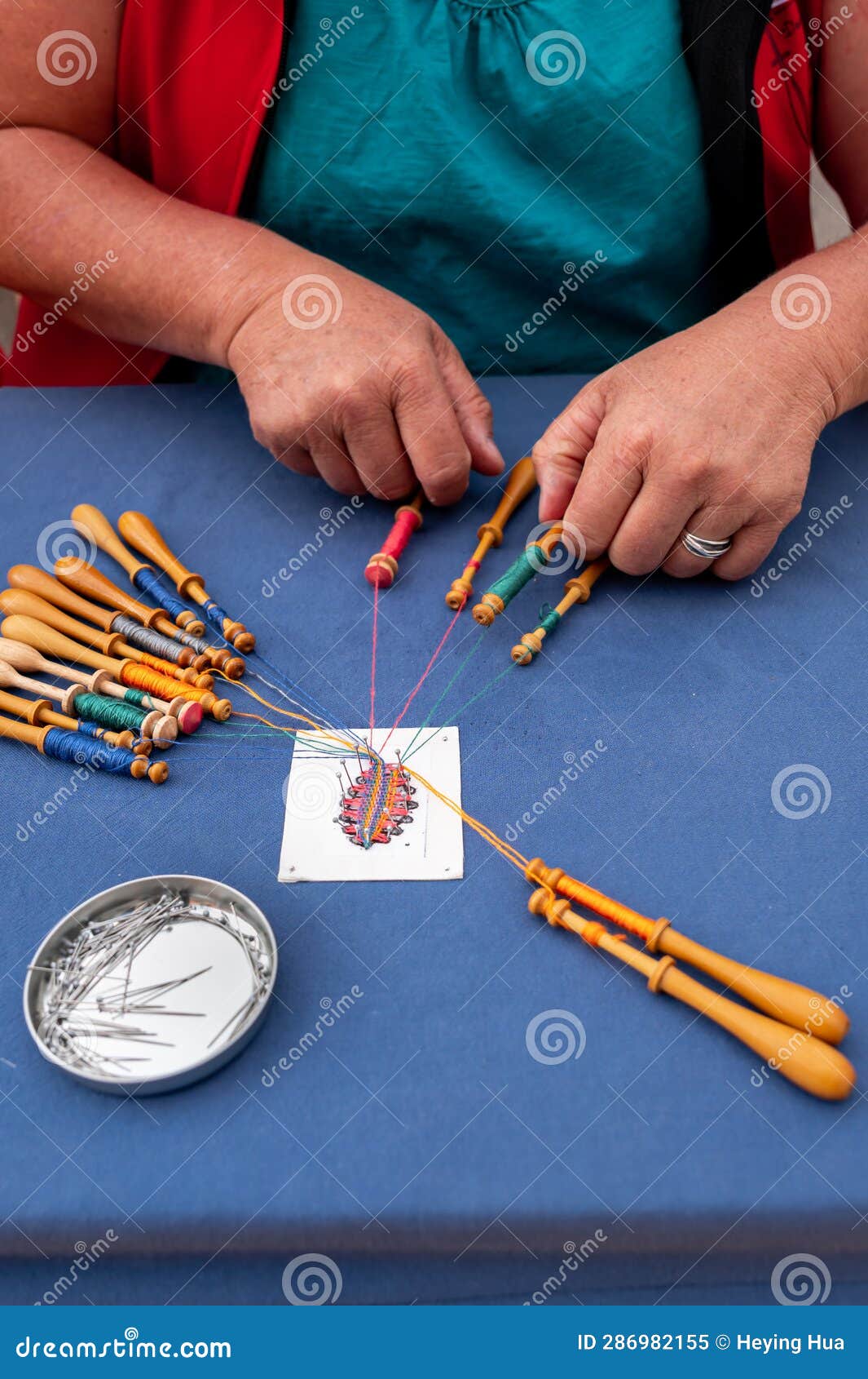 Hands of People Preparing and Making Bobbin Lace. Colorful Lace Threads ...