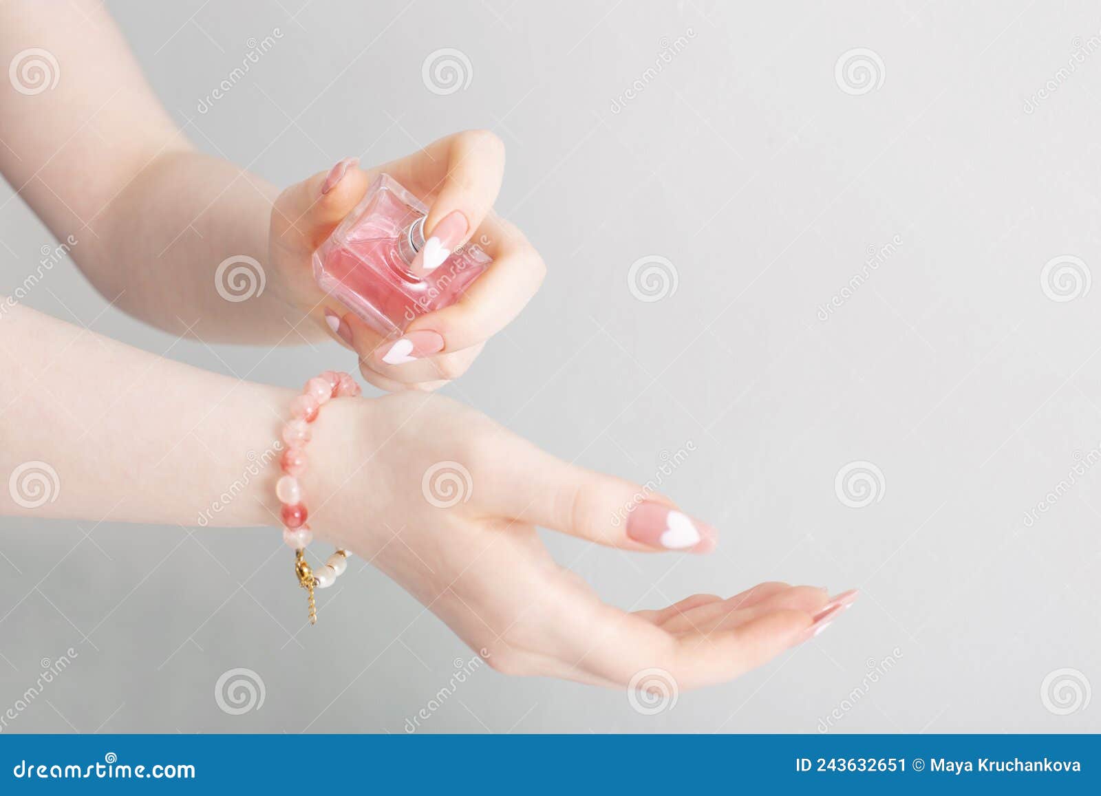 Hands with Perfume Bottle on White Background Stock Image - Image of ...