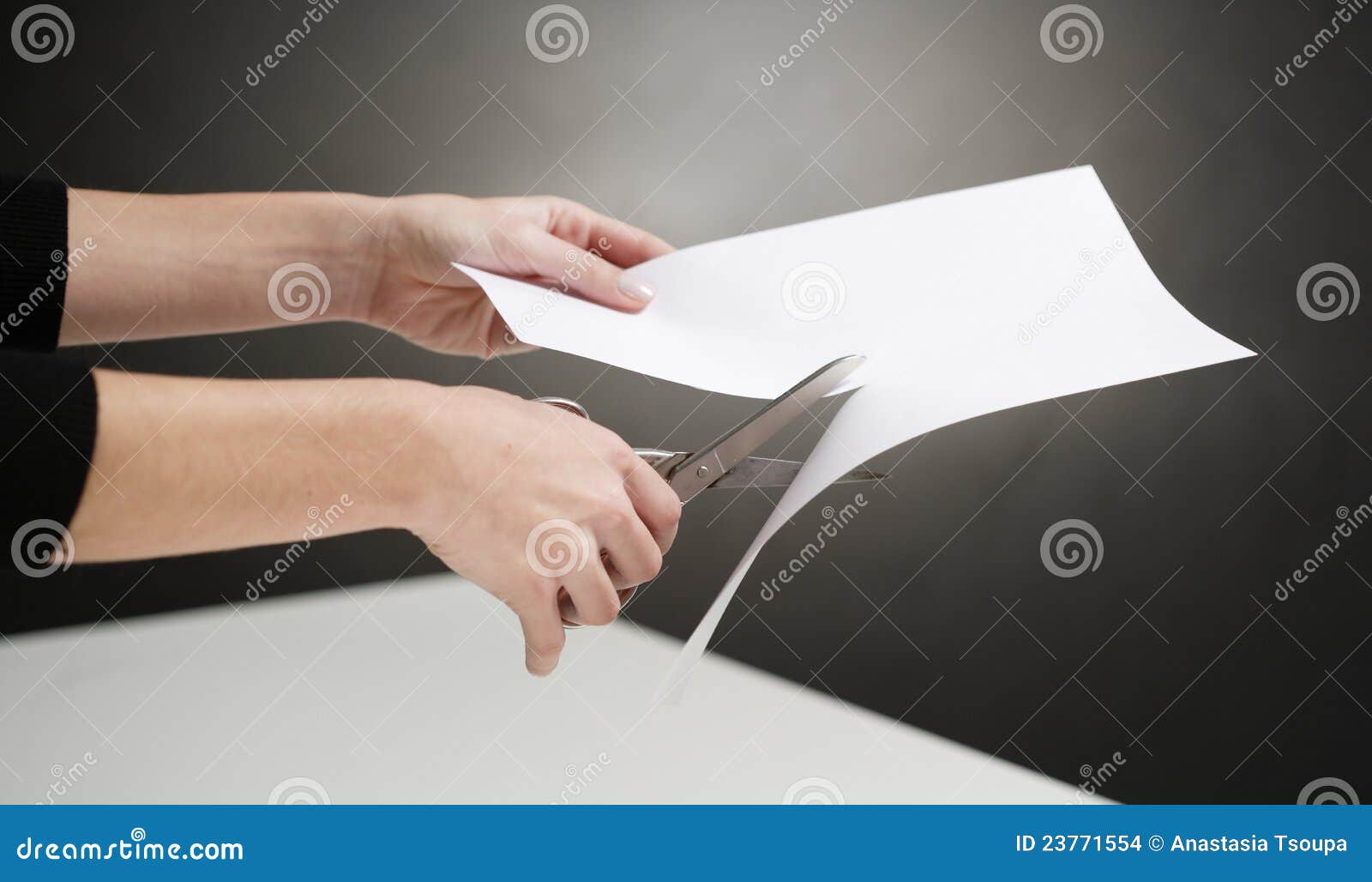 Hands of Person Cutting Paper Stock Photo - Image of adult, arms: 23771554