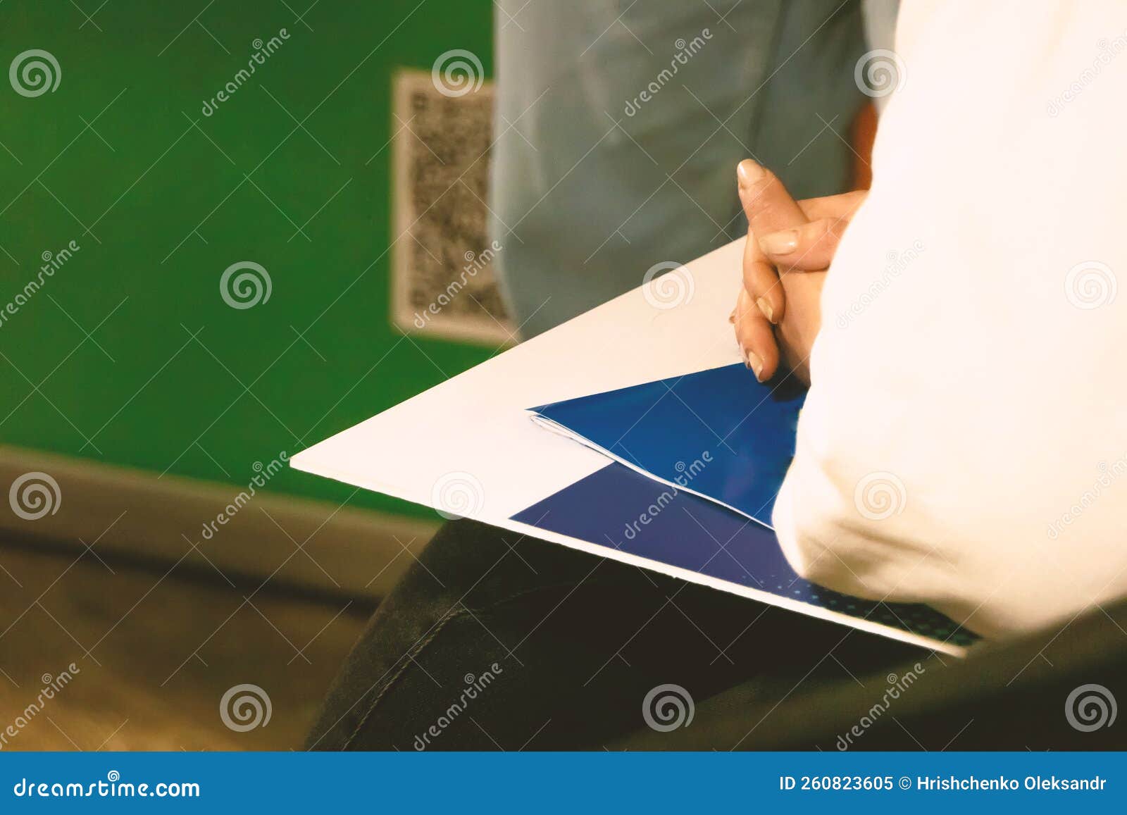 Hands of a Person with Documents Waiting for an Appointment Stock Image ...