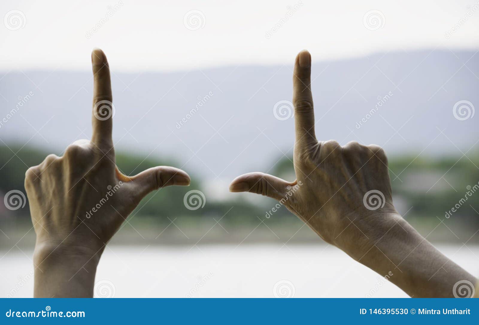 Hands of Person Making Frame Distance or Symbol in Nature Stock Photo ...