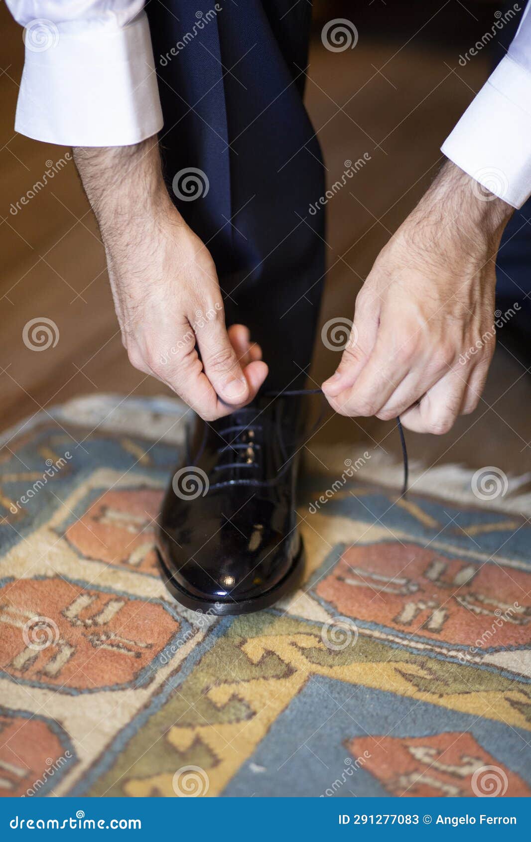 Hands of a Person Tying His Shoe- Stock Image - Image of togetherness ...