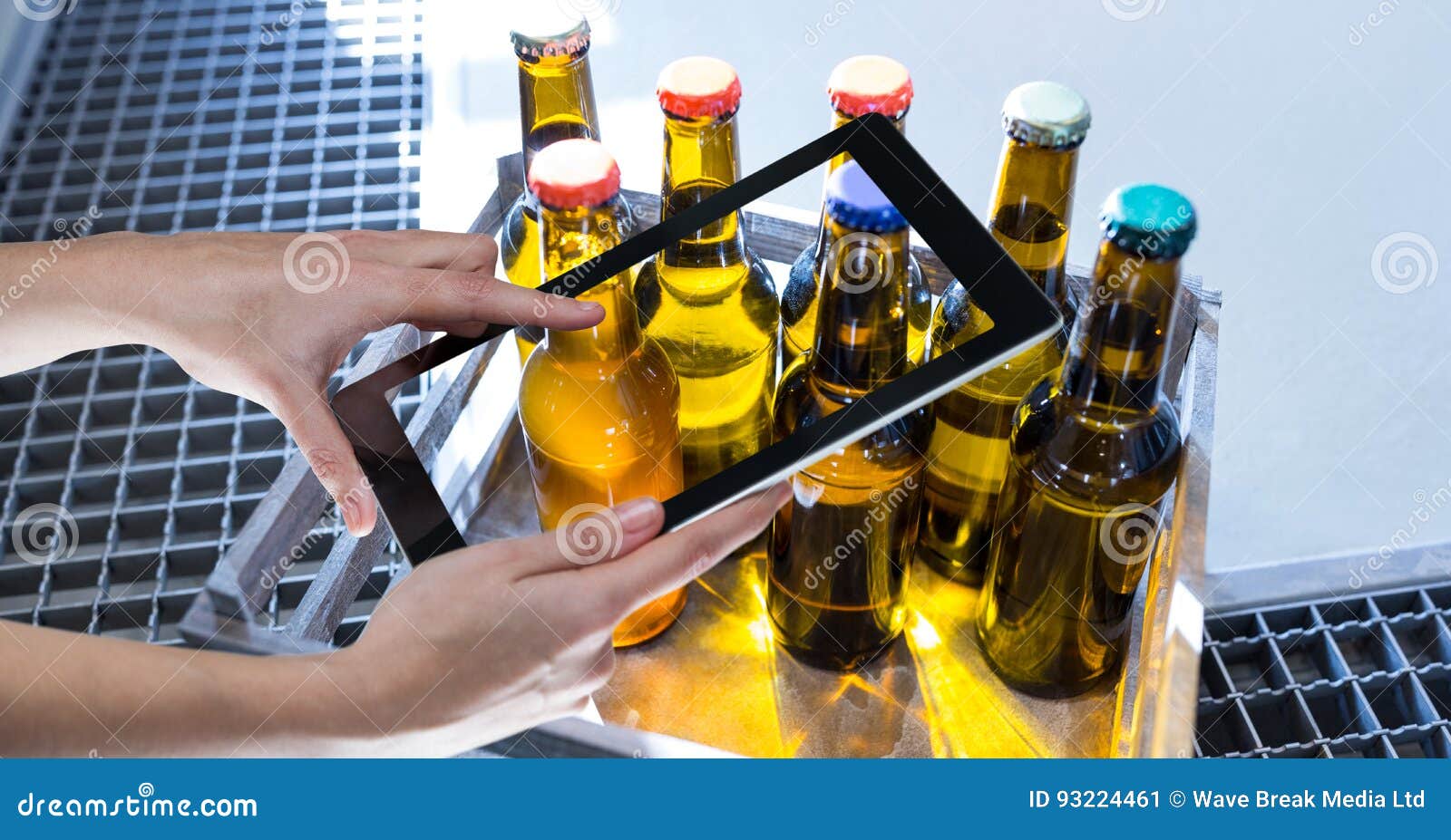 Hands Photographing Beer Bottles through Digital Tablet at Brewery ...