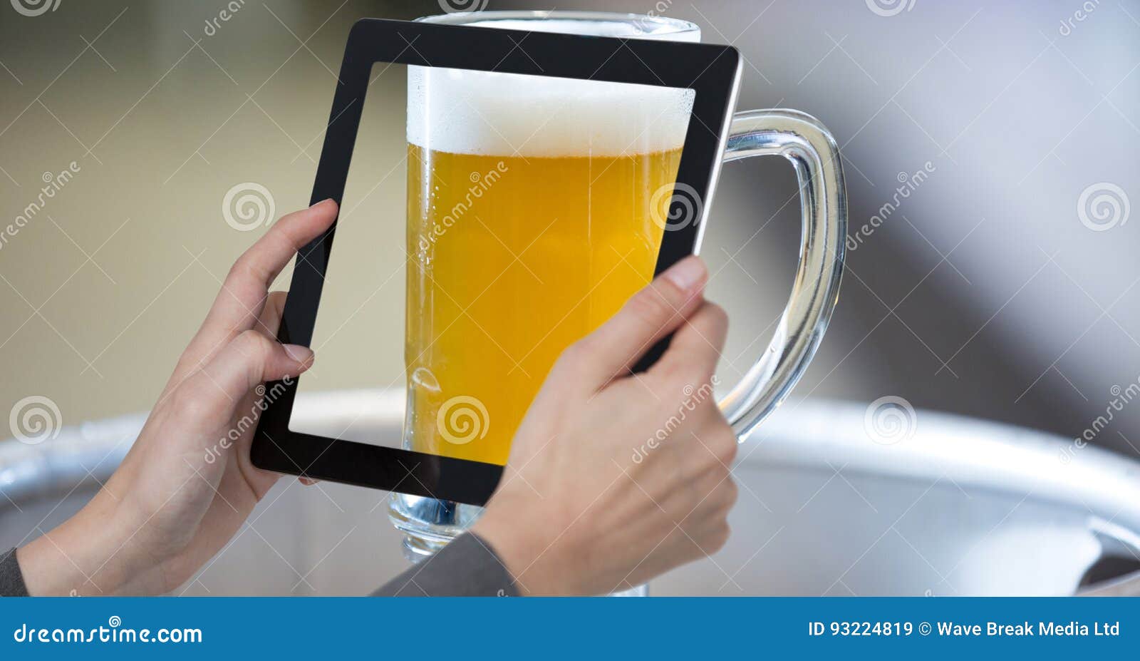 Hands Photographing Glass of Beer through Digital Tablet at Bar Stock ...