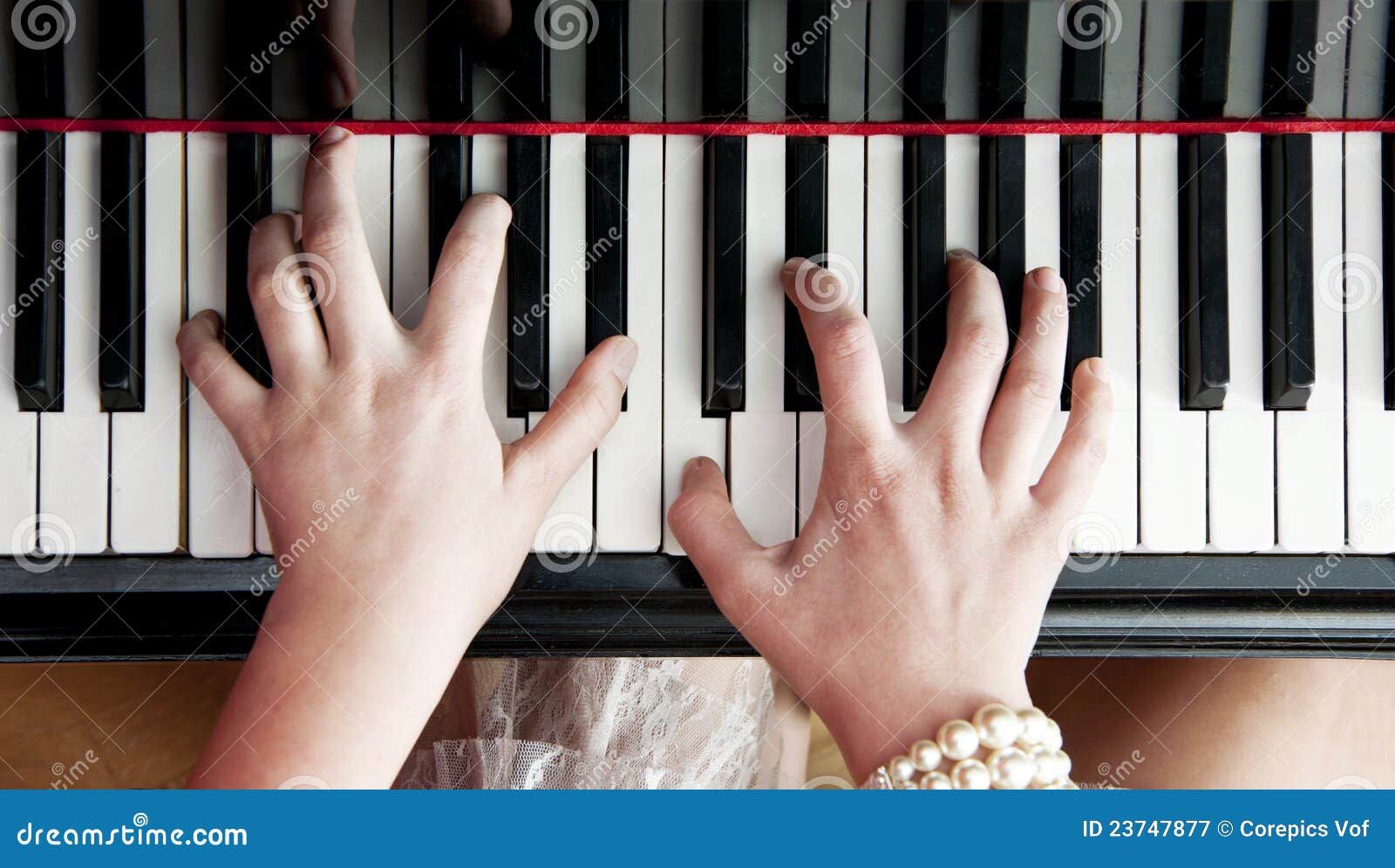 Hands on piano keys stock image. Image of young, performer - 23747877
