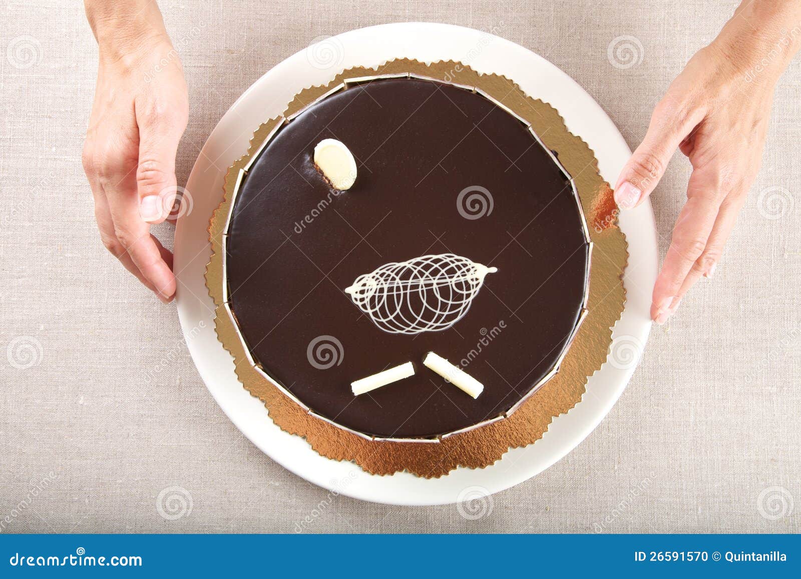 Hands Placing a Chocolate Cake Stock Photo - Image of gourmet, candy ...