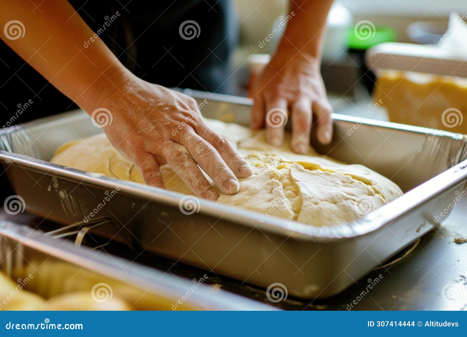 Hands Placing Dough into a Bread Pan for Proofing Stock Photo - Image ...