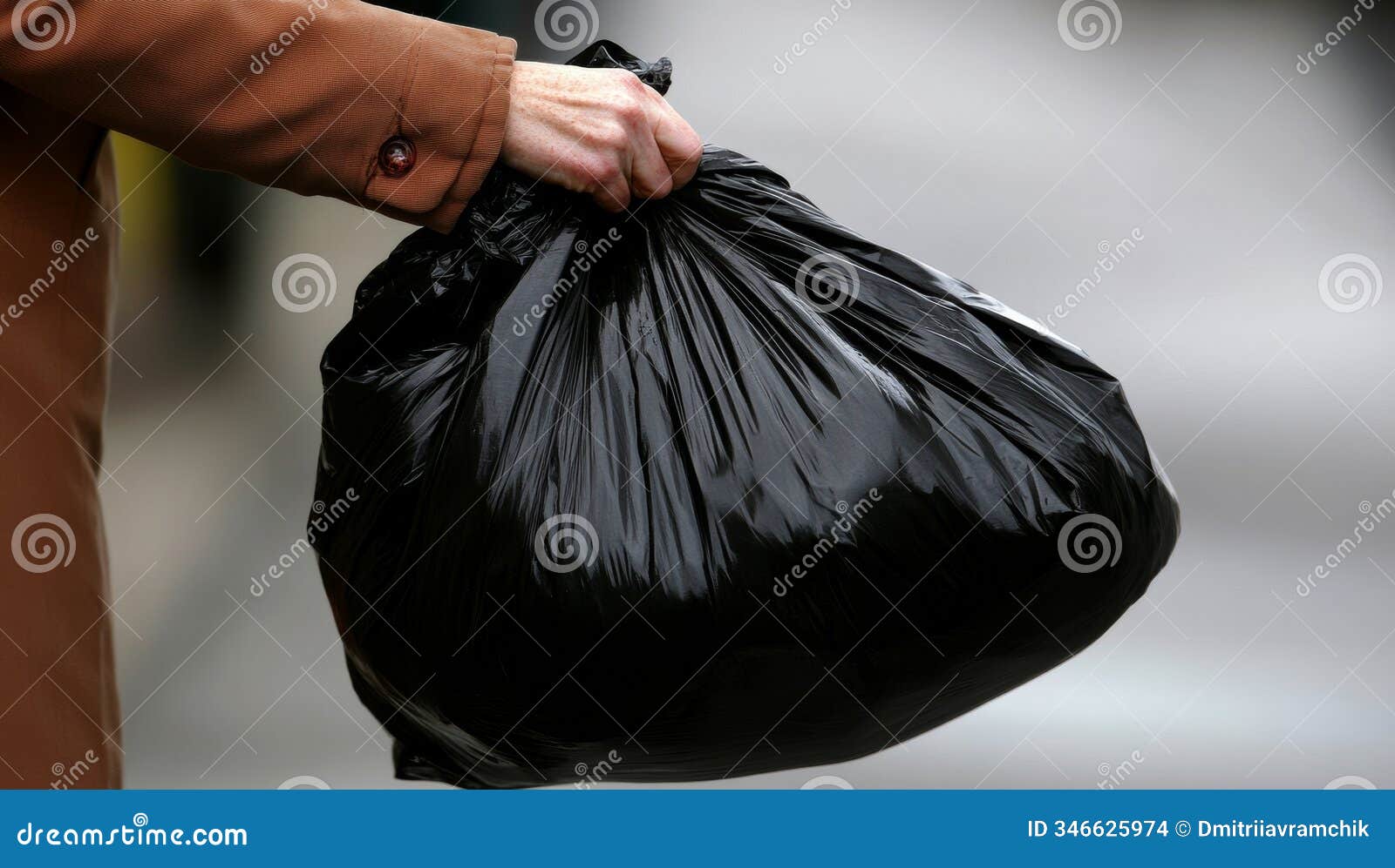 Hands Placing a Garbage Bag in a Trash Can Stock Photo - Image of ...