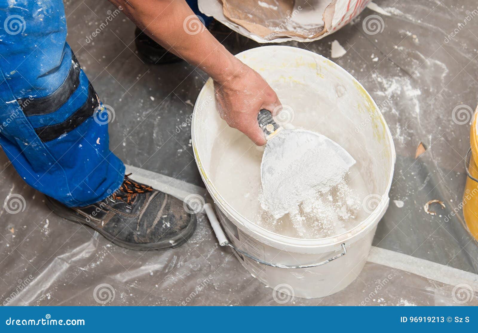 Hands plasterer at work stock image. Image of plastering - 96919213