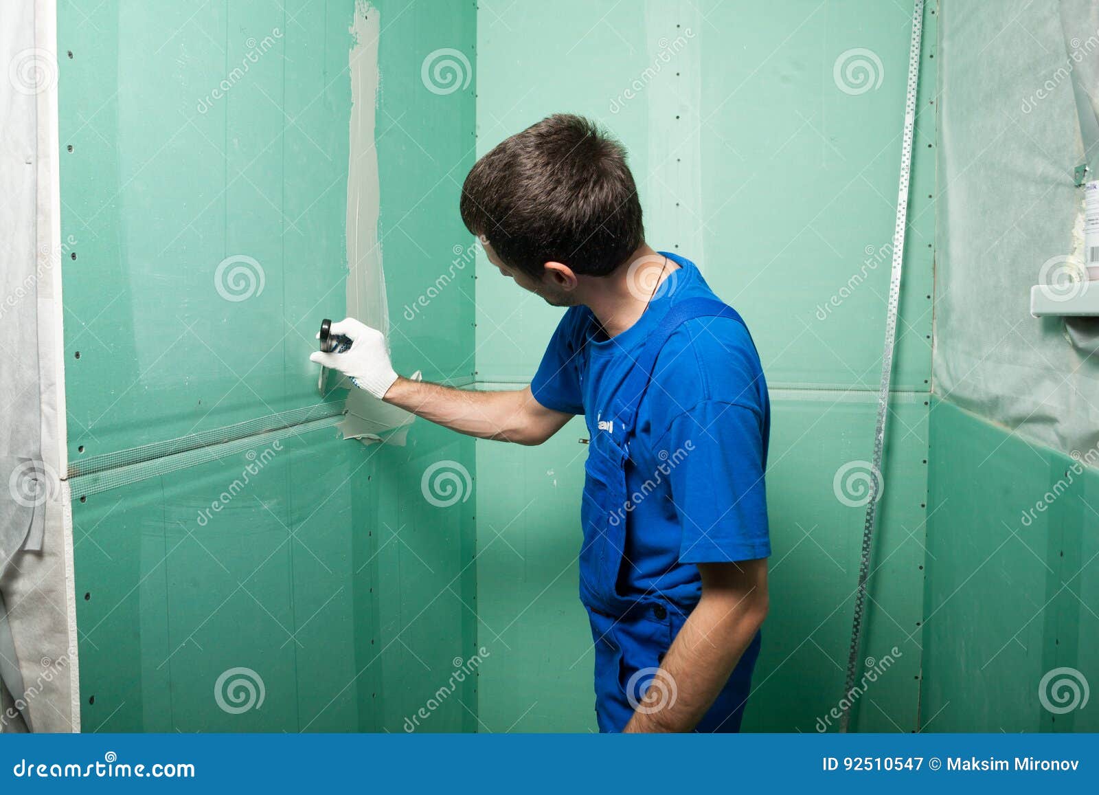Hands Plasterer at Work. Application of the Plaster on the Wall Stock ...
