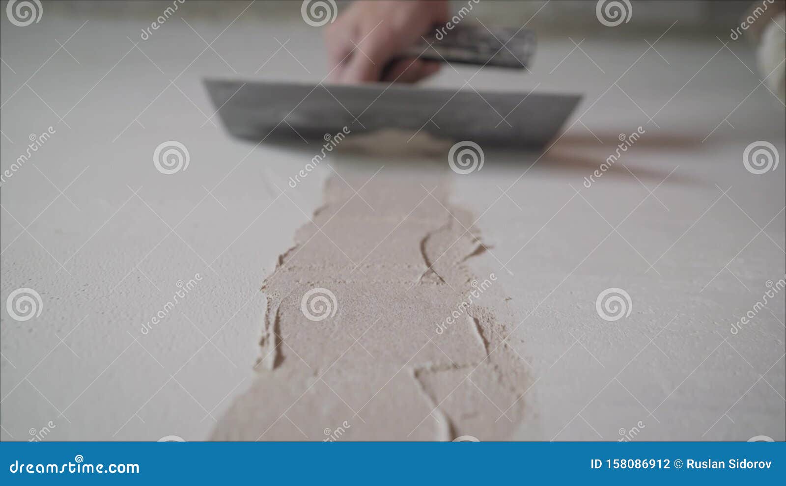Plastering the Wall. Hands Plasterer at Work. Application of the ...