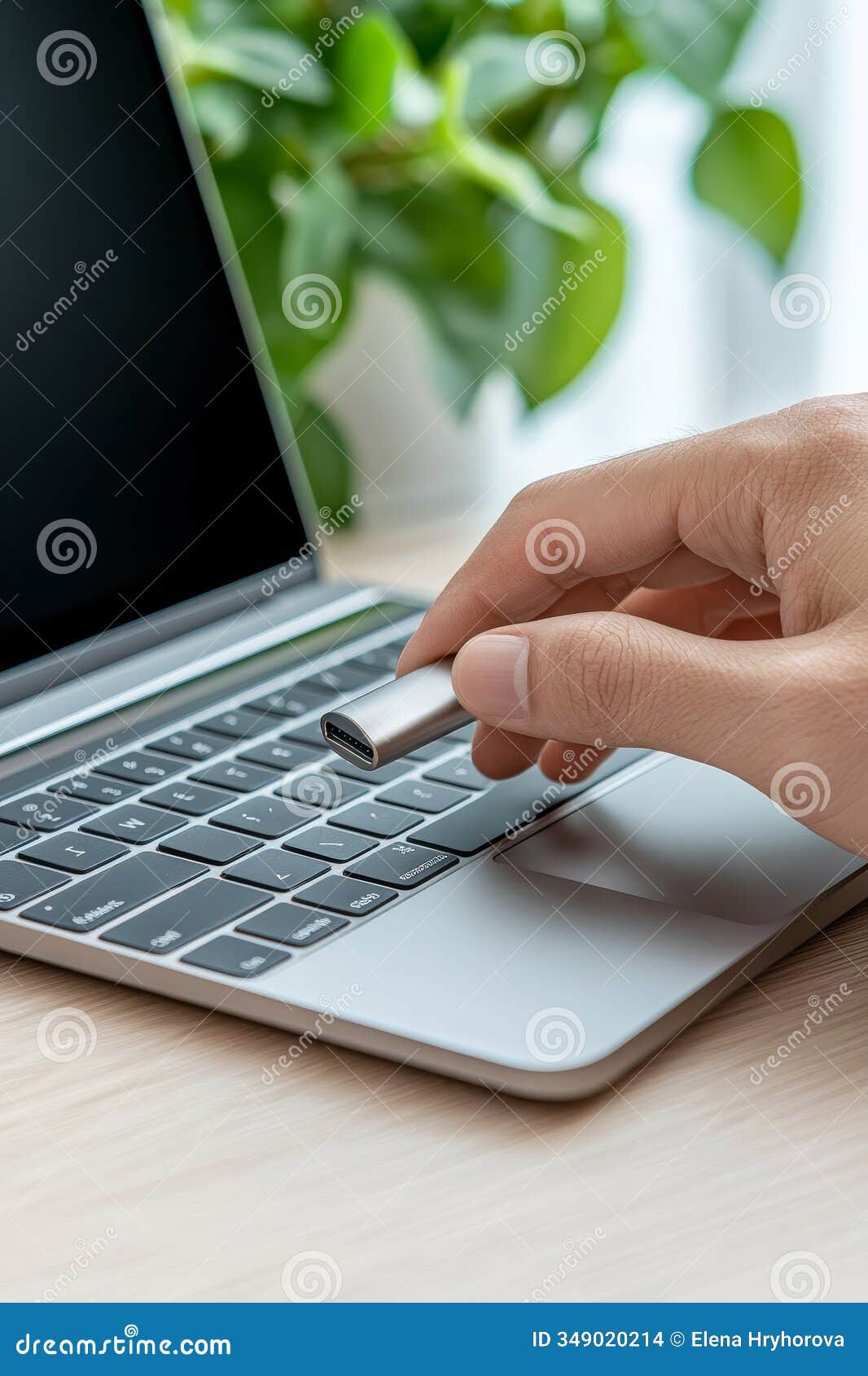 Hands Plugging a USB Device into a Laptop, Close-up of Hands and ...