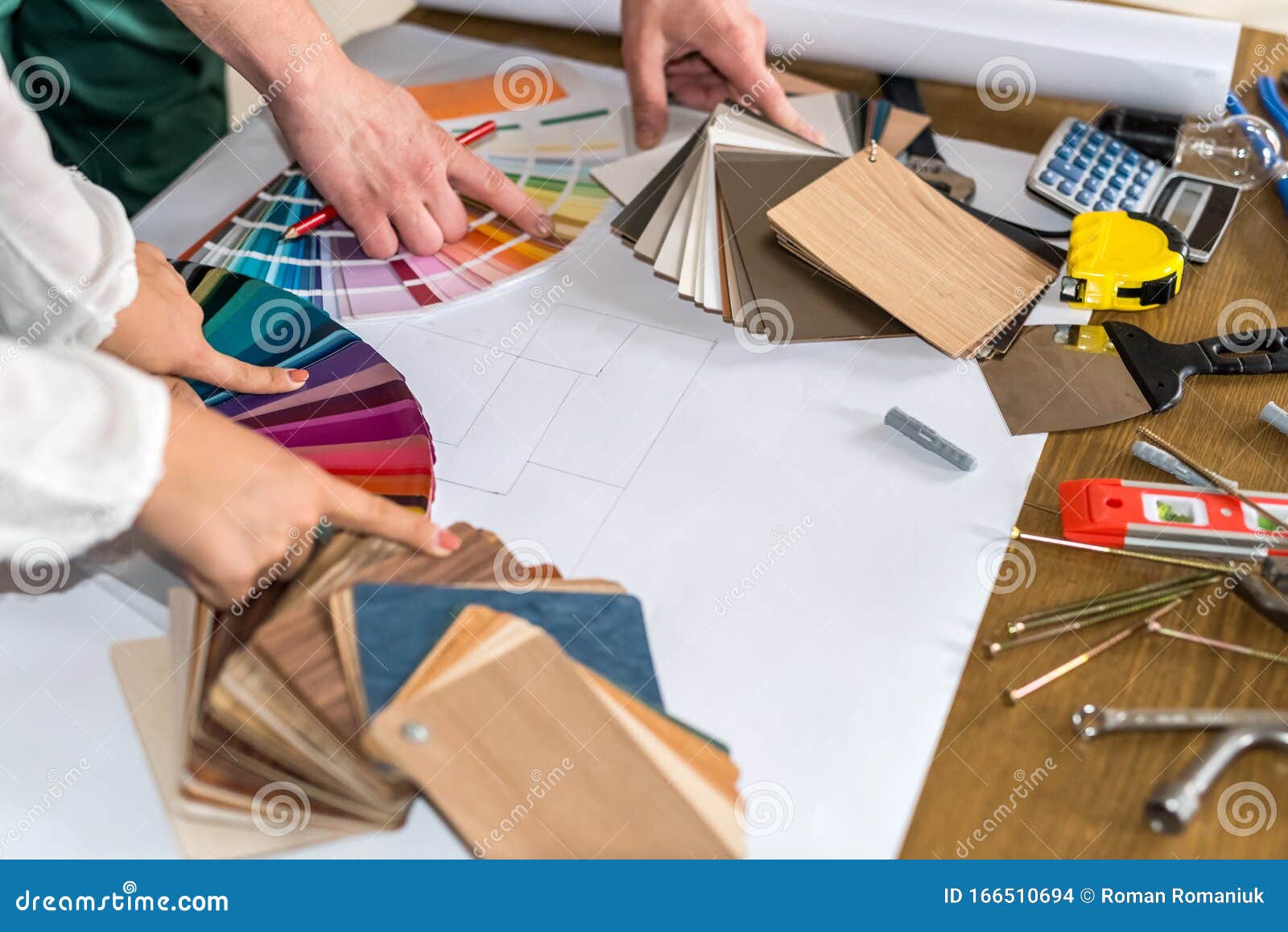 Hands Pointing on Colour Samples for Renovation, Closeup Stock Photo ...