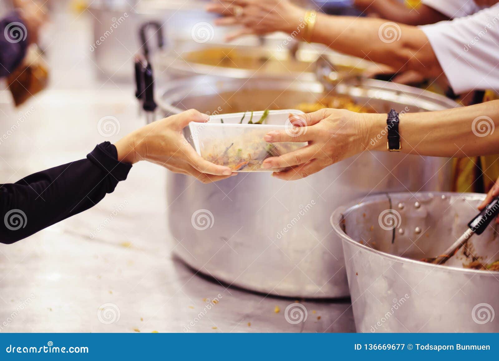The Hands of the Poor Bring the Container To Fill the Food To Bring ...
