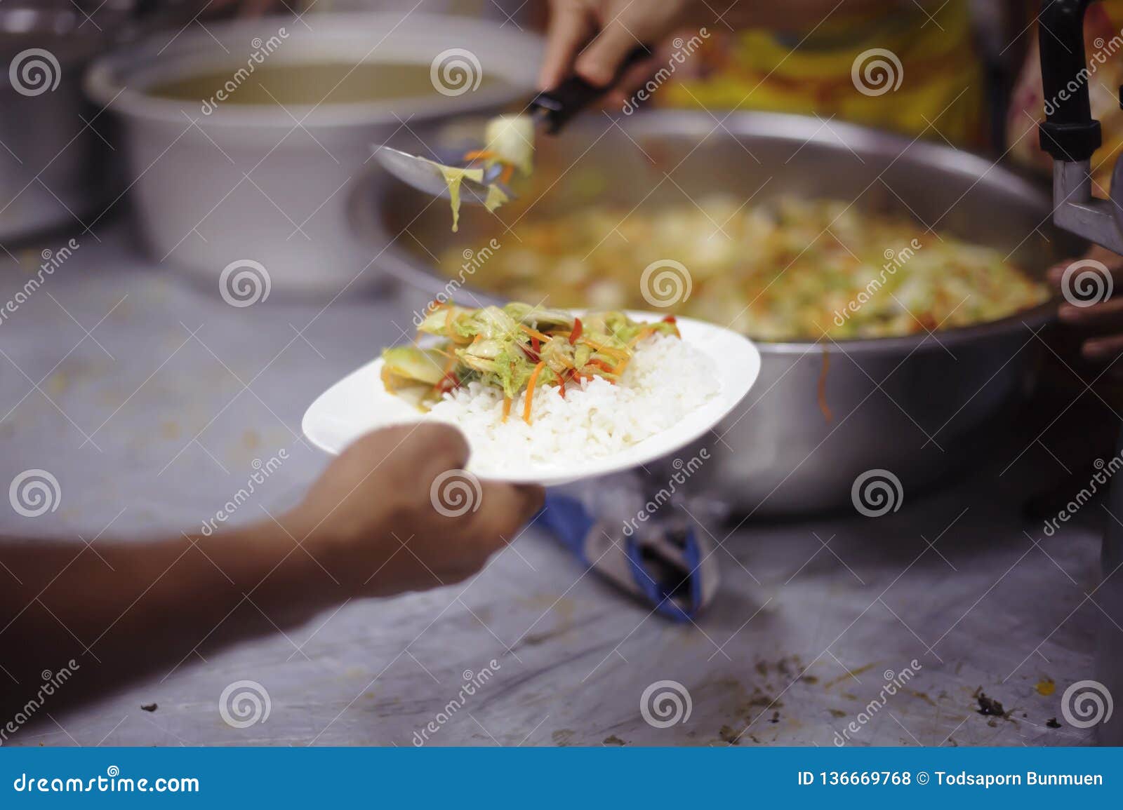 The Hands of the Poor Bring the Container To Fill the Food To Bring ...