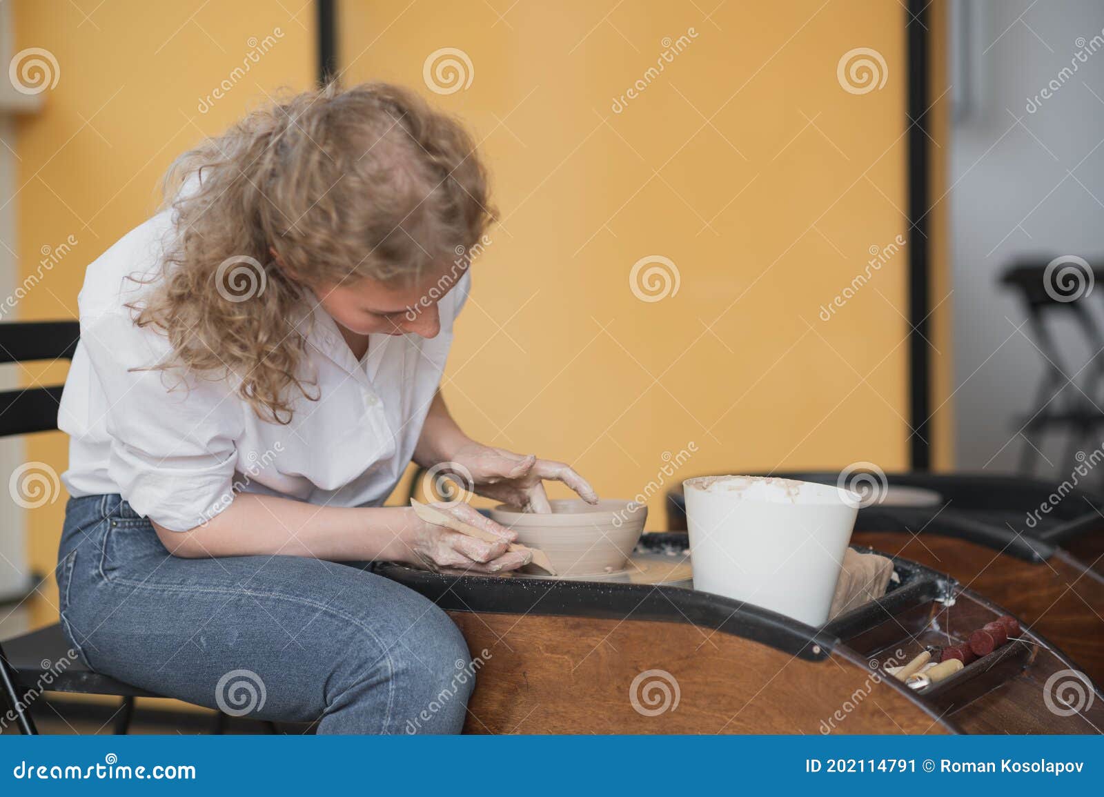 Hands of a Potter, Creating an Earthen Jar on the Circle Stock Image ...