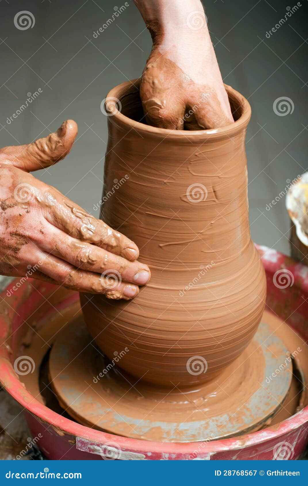 Hands of a Potter, Creating an Earthen Jar on the Circle Stock Image ...