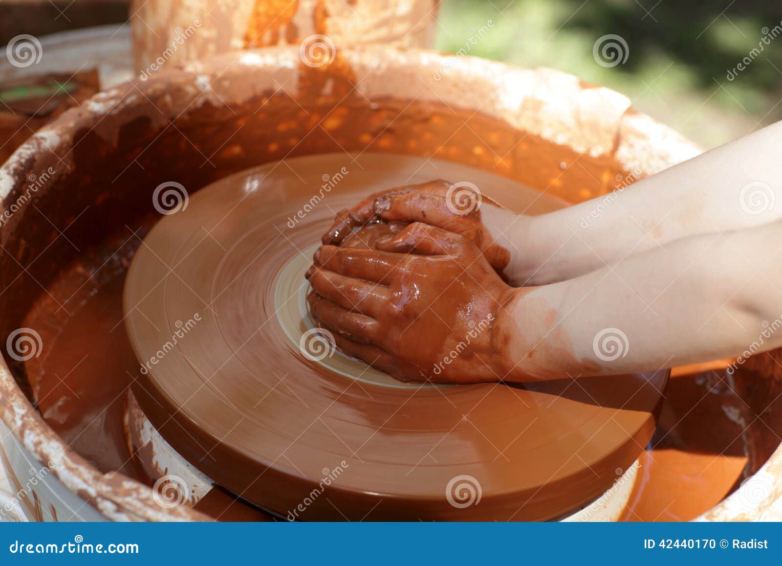 Hands on pottery wheel stock photo. Image of helping - 42440170