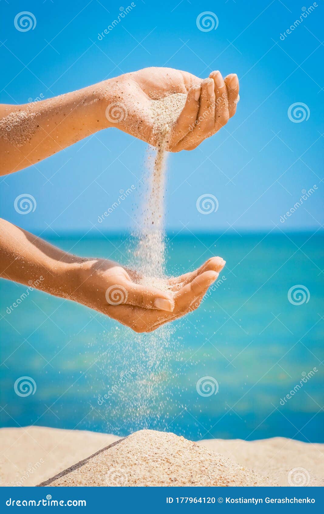 A Hands are Pouring Sand by the Sea Stock Photo - Image of water ...