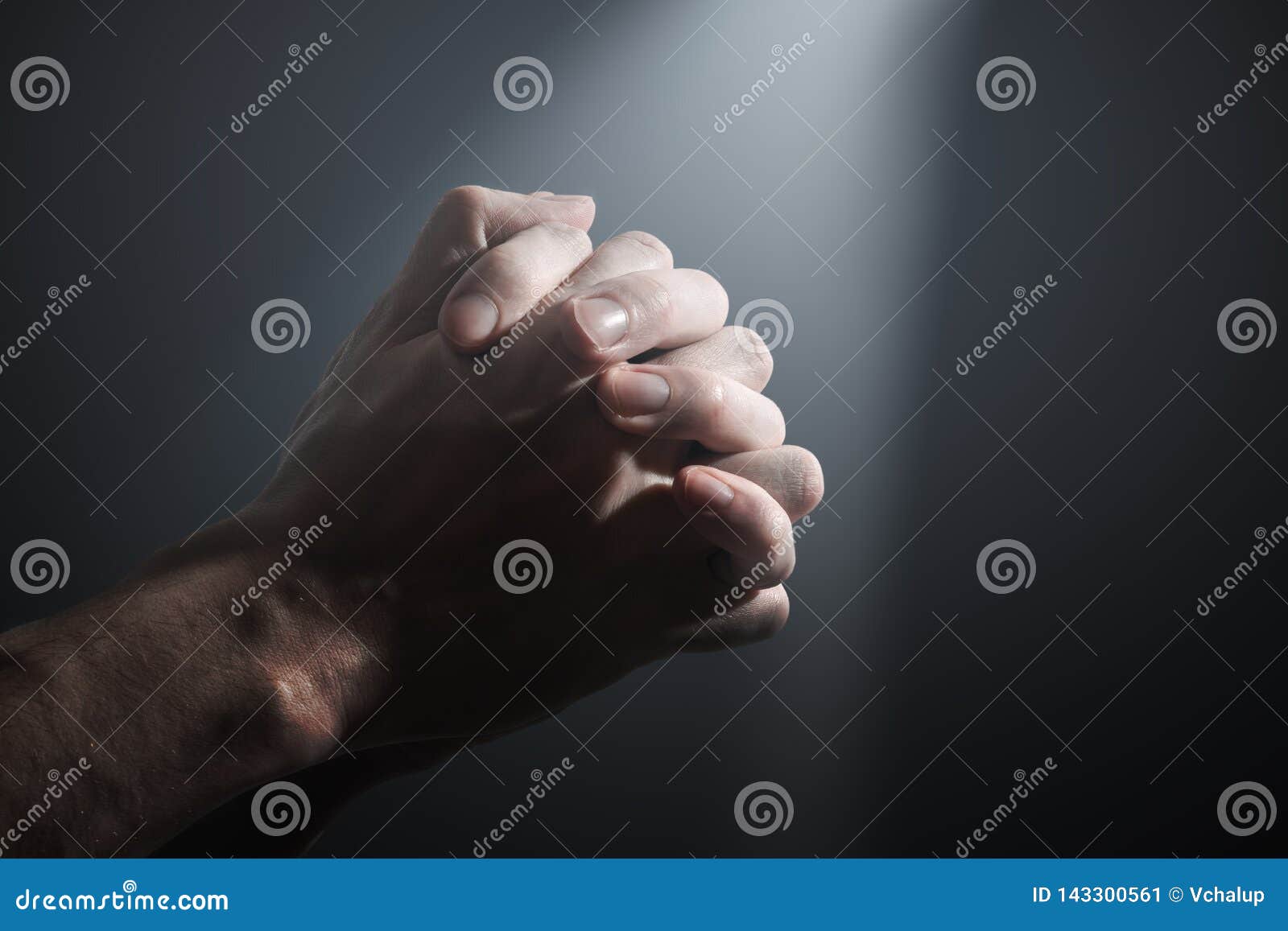 Hands of a Prayer. Light Shining on Praying Man`s Hands. Stock Image ...