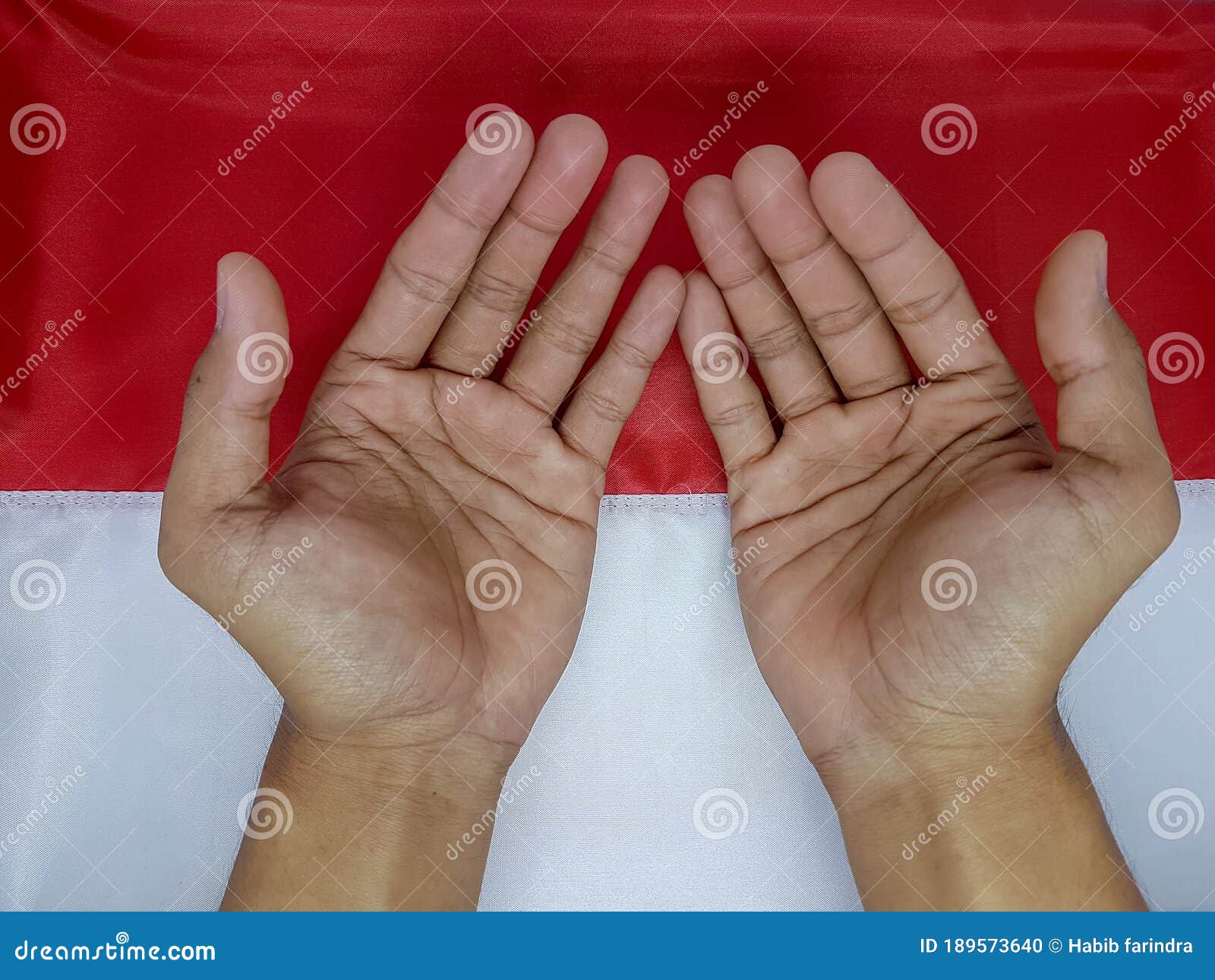 Hands are Praying on the Indonesian Flag Stock Photo - Image of asia ...