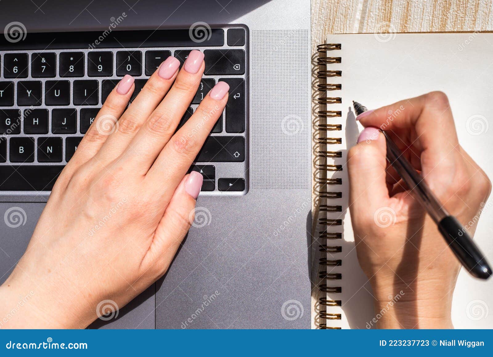 Hands Pressing Computer Keyboard Keys while Writing with Pencil in ...