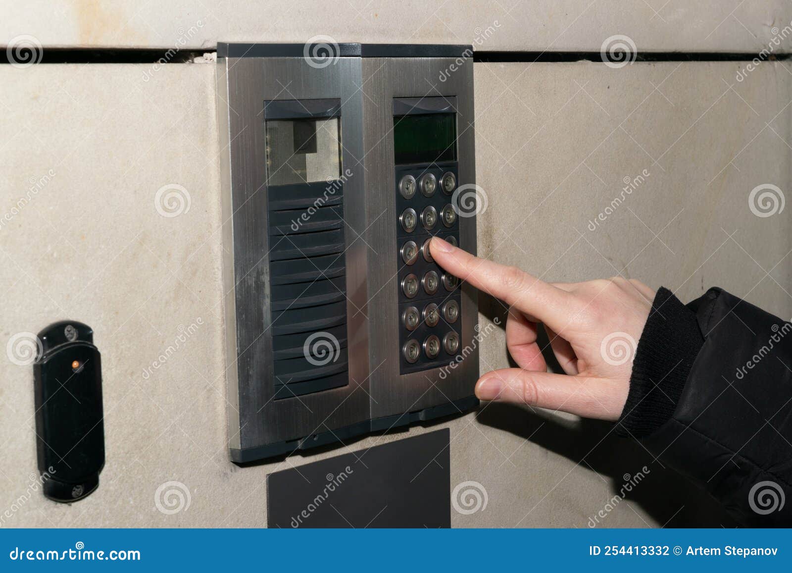 Hands Pressing on Intercom stock photo. Image of panel - 254413332