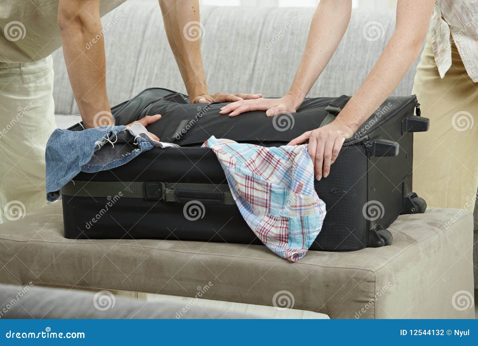 Hands pressing suitcase stock photo. Image of color, detail - 12544132