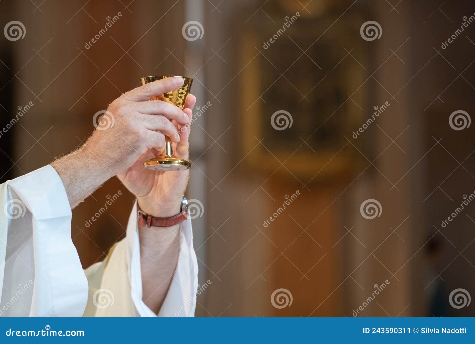 Hands of a Priest Raise a Chalice Editorial Photo - Image of closeup ...
