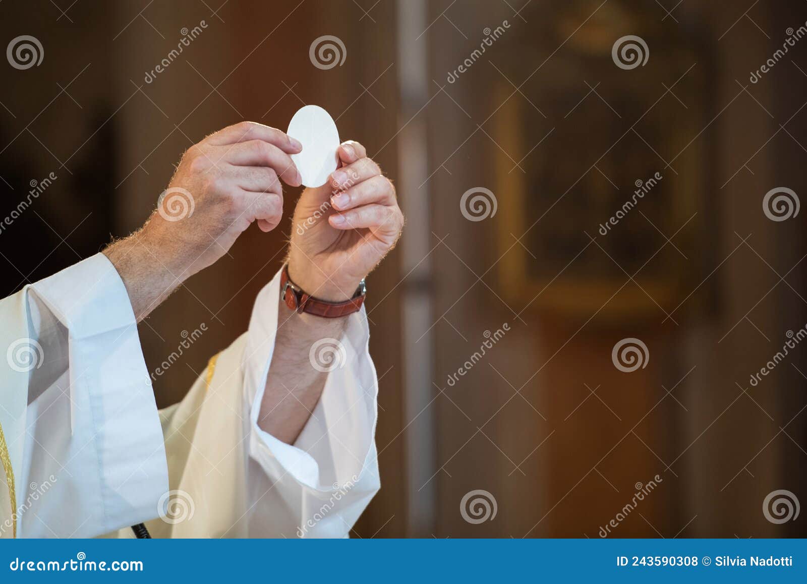 Hands of a Priest Raise a Chalice Stock Photo - Image of eucharist ...