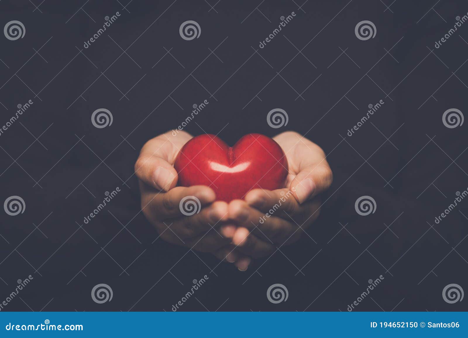Hands protect a heart stock photo. Image of hands, heart - 194652150