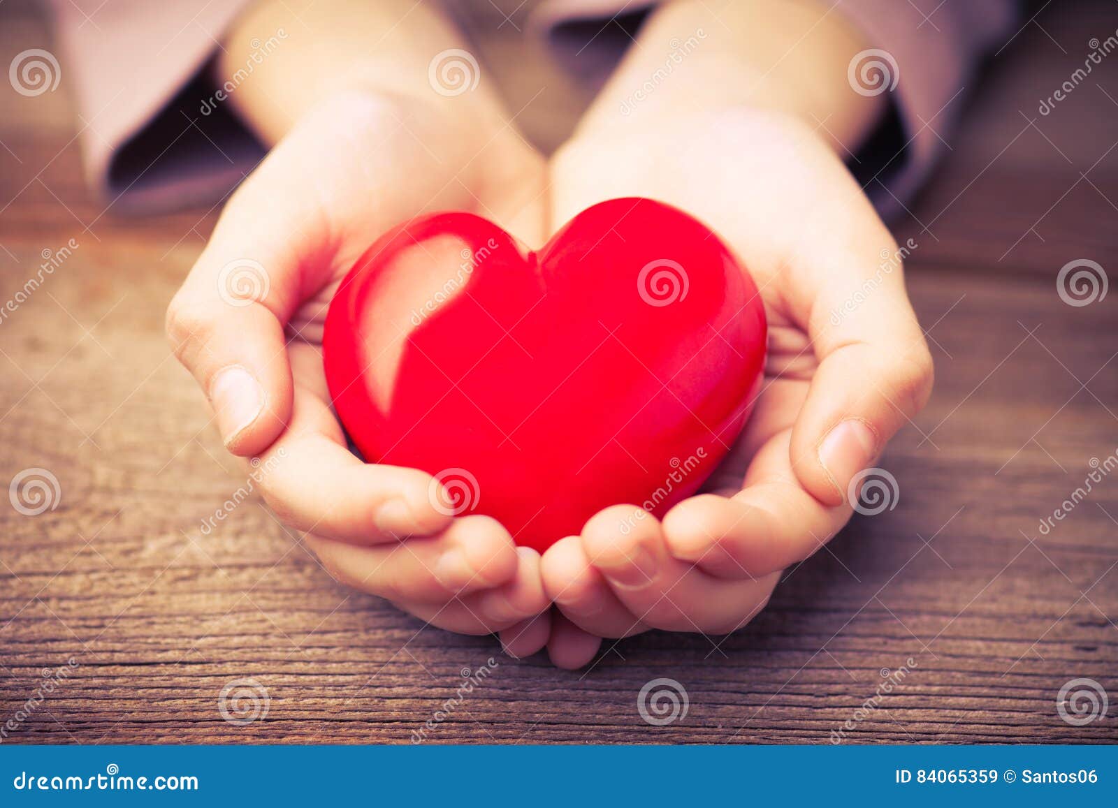 Hands protect a heart stock image. Image of concept, love - 84065359