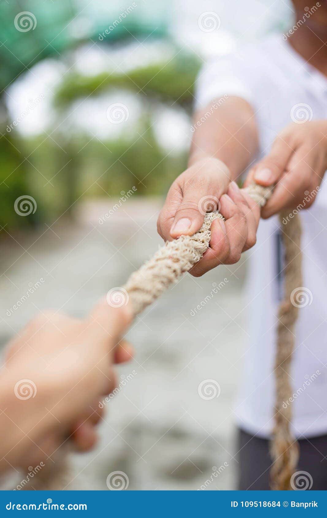 Hands pulling rope stock photo. Image of white, rope - 109518684