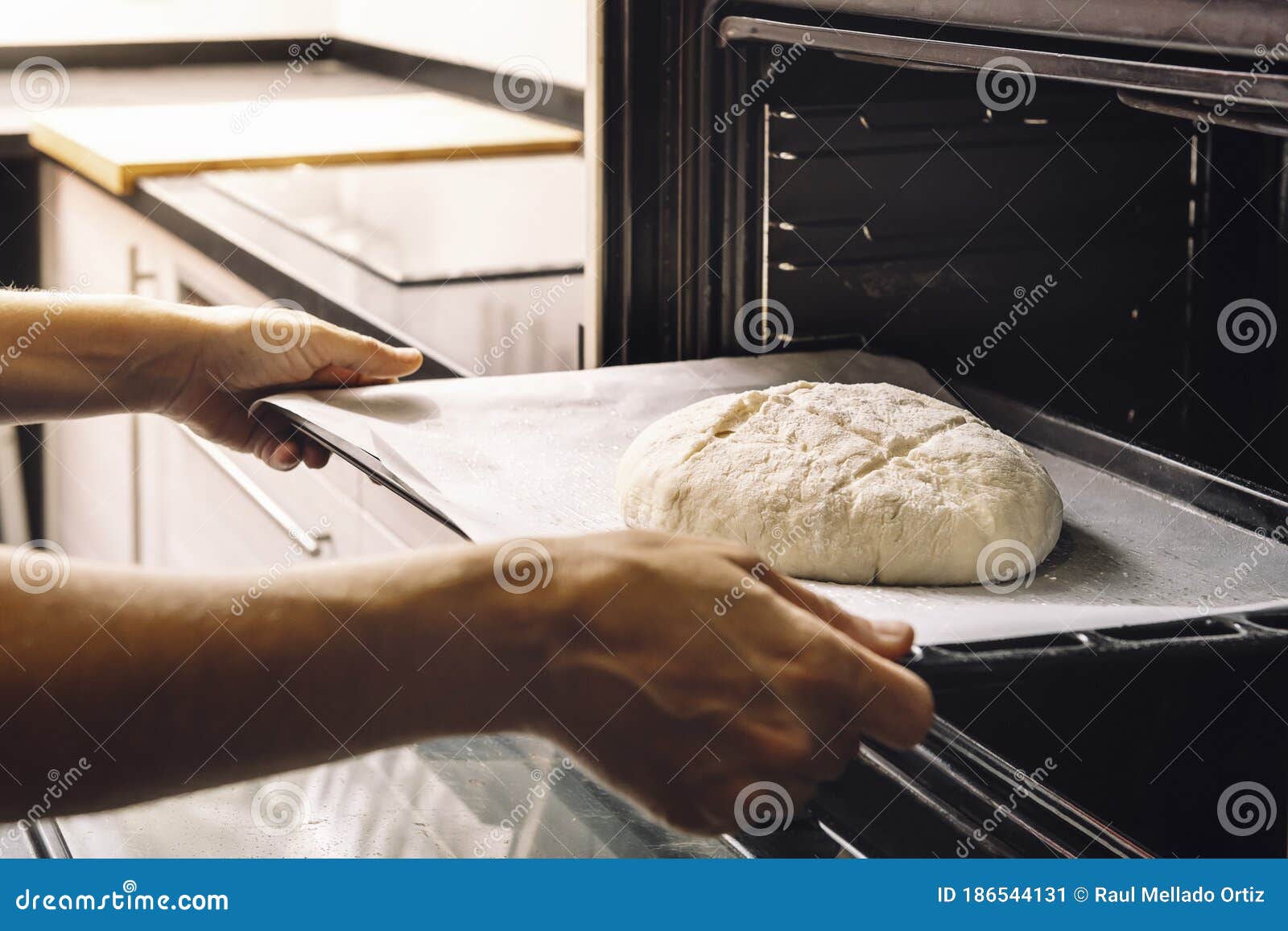Hands Putting Bread Dough in the Oven Stock Image - Image of grocery ...