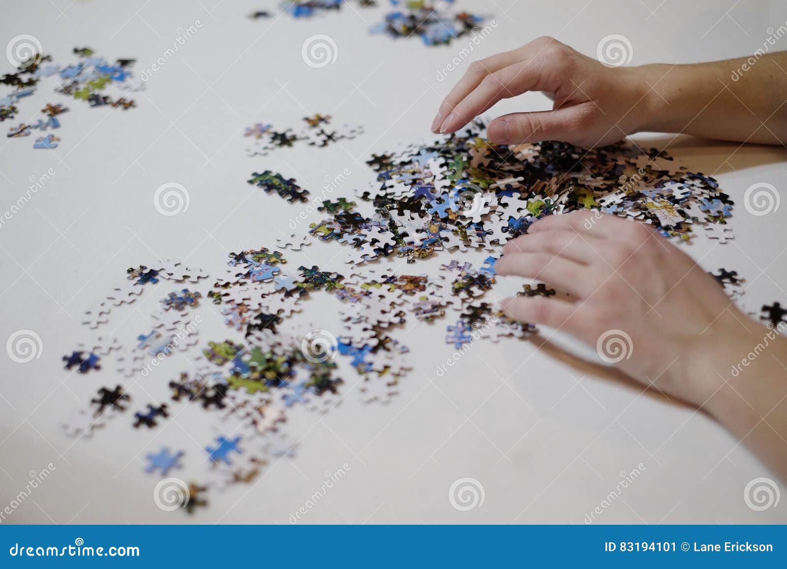 Hands Putting Puzzle Together Stock Image - Image of hand, installing ...