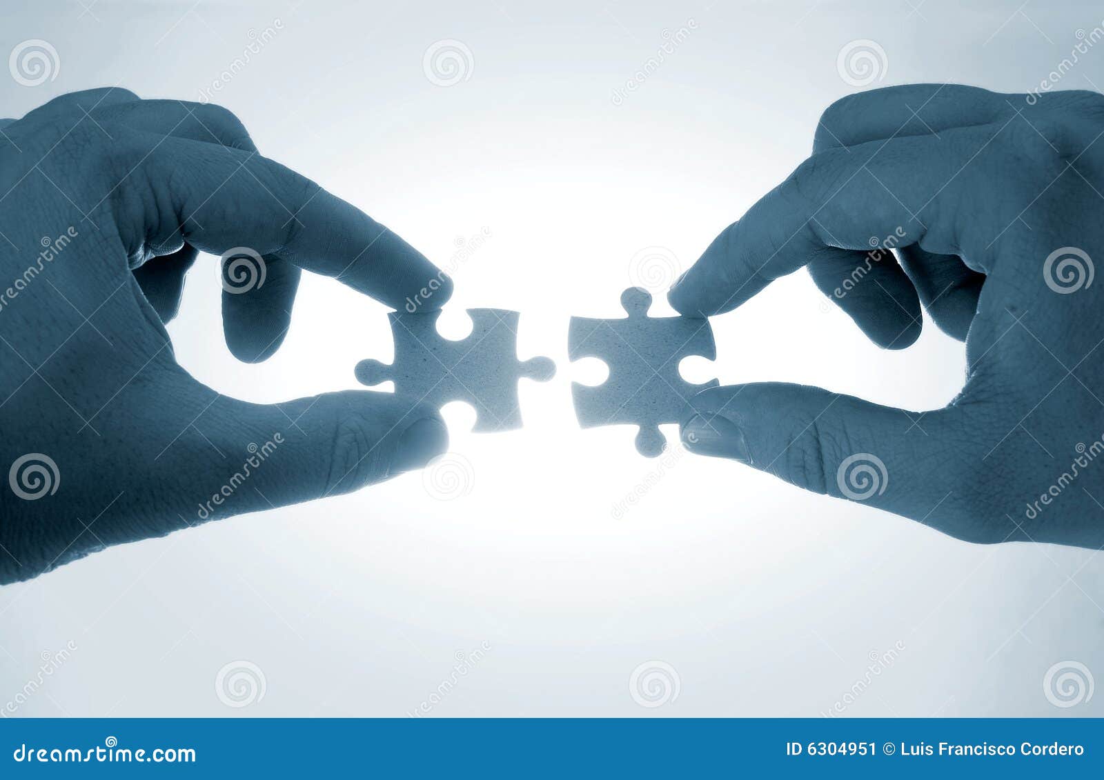 Hands and Puzzle Pieces in Blue Stock Image - Image of attached ...