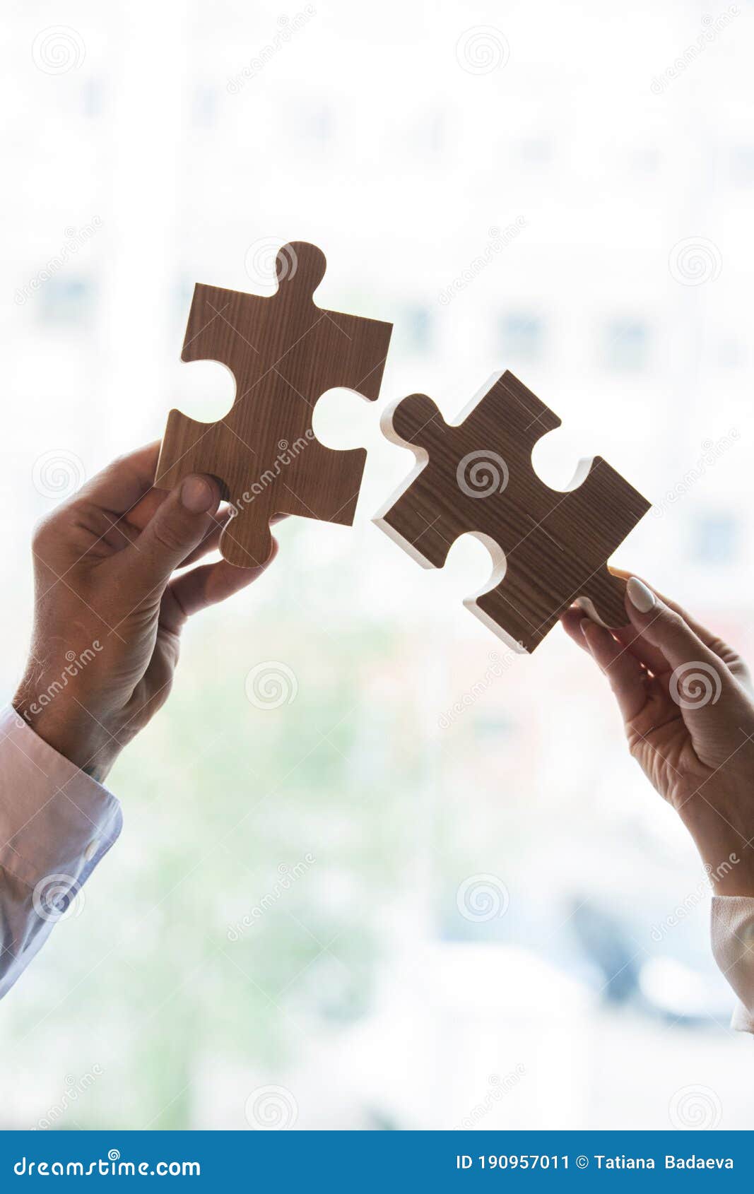 Hands with puzzle pieces stock image. Image of connect - 190957011