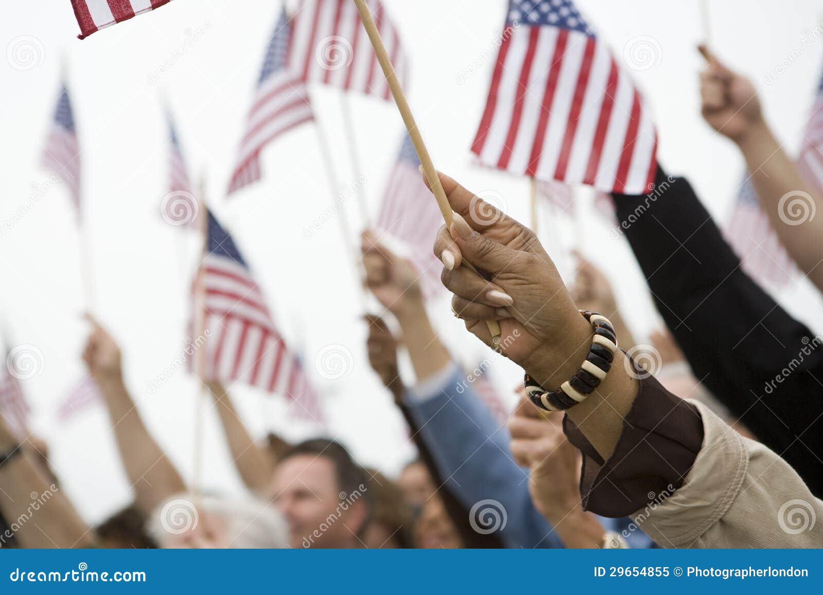 Hands Raising American Flag Stock Image - Image of patriotism, raising ...